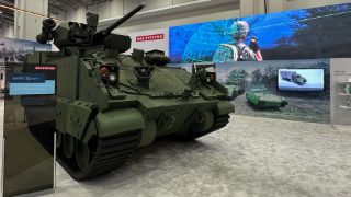 BAE Systems presents two Armored Multi-Purpose Vehicle prototypes equipped with different ...